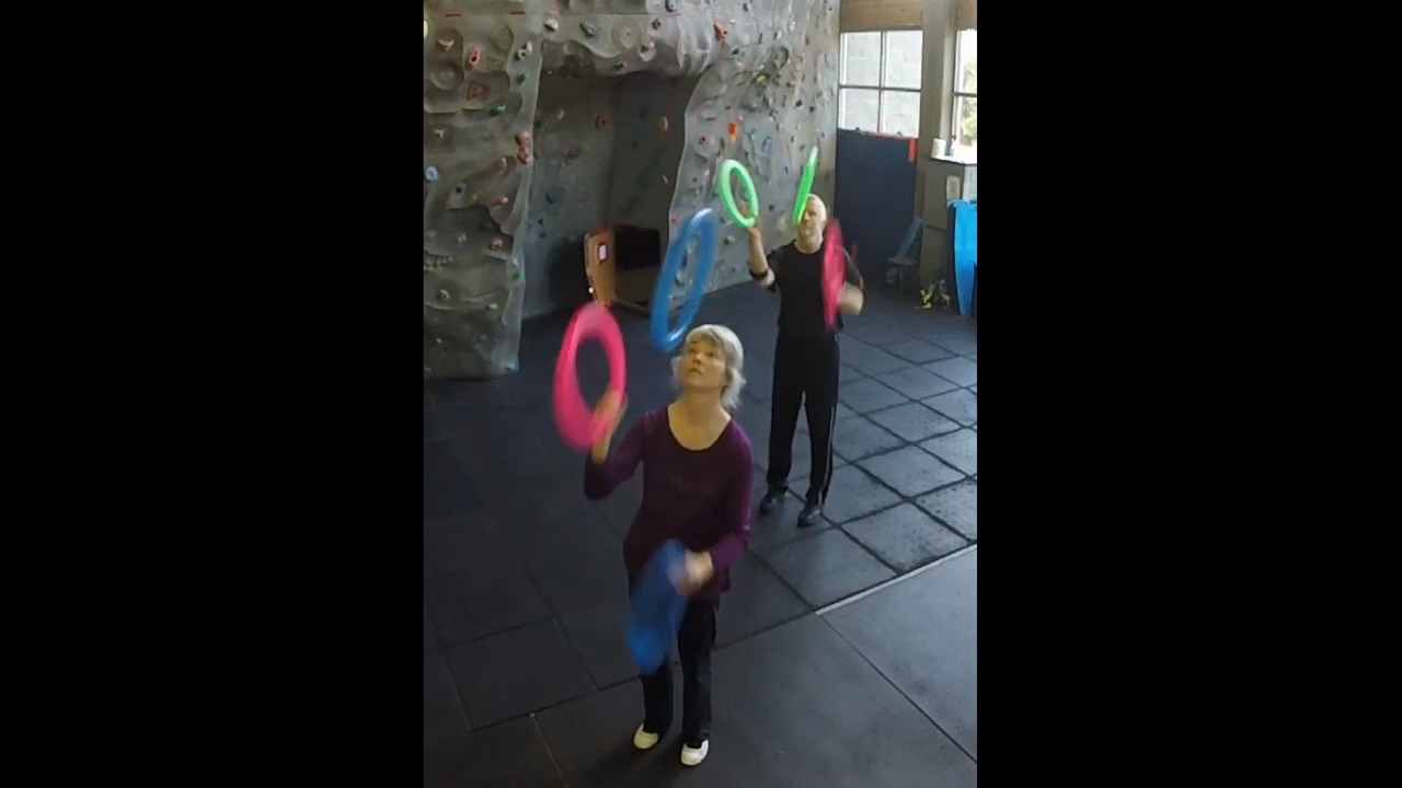 Couple Passes Rings to Each Other While Juggling Them | Jukin Licensing