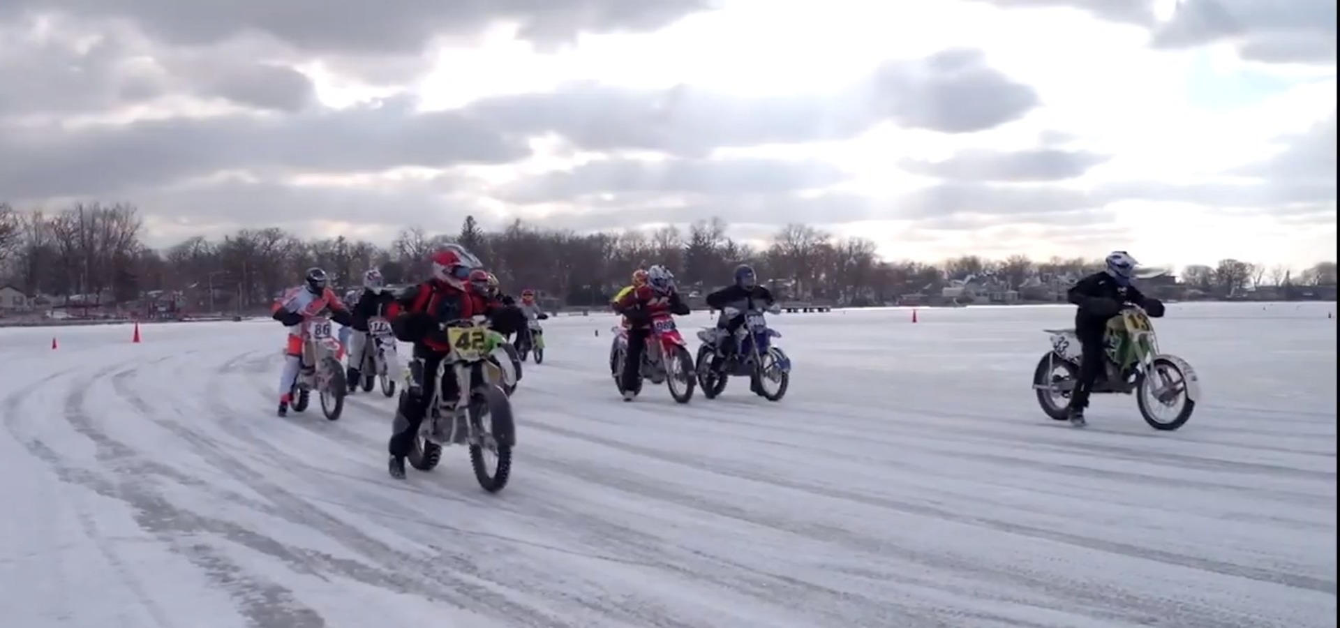 People Compete Against Each Other on Motorcycles and Quads in Race Over ...