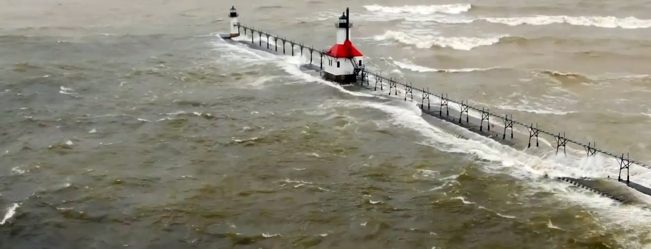 Gale Waves Hit Lighthouse on Lake Michigan | Jukin Licensing