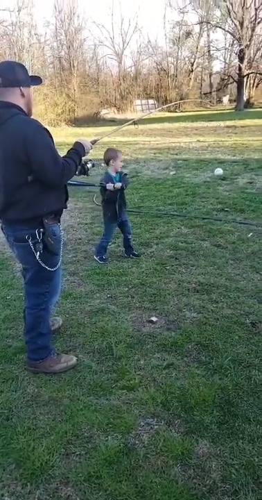 Dad Uses Fishing Rod to Hang Ball for Son to Hit While Playing Baseball ...