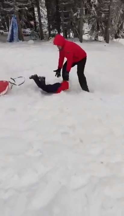 Kid Faceplants Into Snow While Sledding Downhill | Jukin Licensing