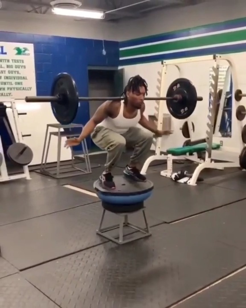 Guy Fails At First But Succeeds Later While Lifting Weights In an ...