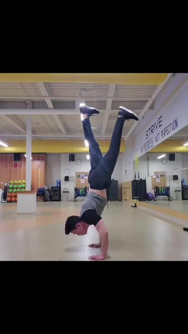 Guy Walks Mid-Air While Attempting Handstand | Jukin Licensing