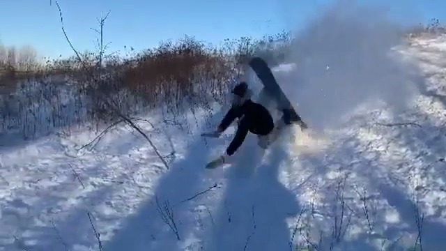 Guy Snowboarding Down Icy Slope Faceplants to the Snow | Jukin Licensing