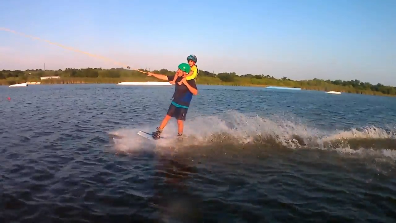 Kid Enjoys Wakeboarding With Dad While Riding on His Shoulders | Jukin ...