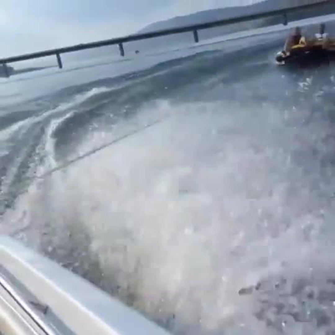 Two People Fall Of Tube And Fall Into Water | Jukin Licensing