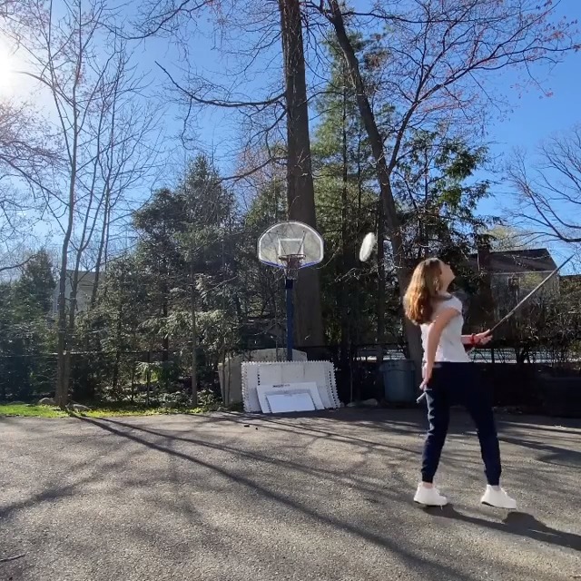 Girl Makes Trick Shot By Throwing Frisbee Through Basketball Hoop While ...