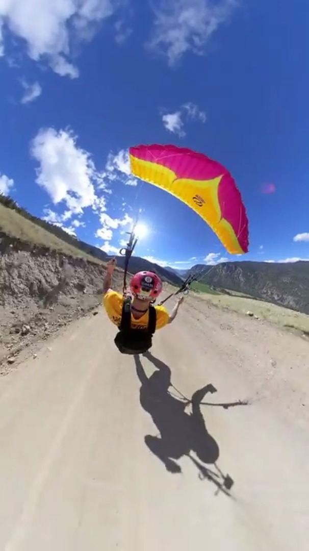 Paraglider Flies Close to Terrain While Speed Flying Around Scenic ...