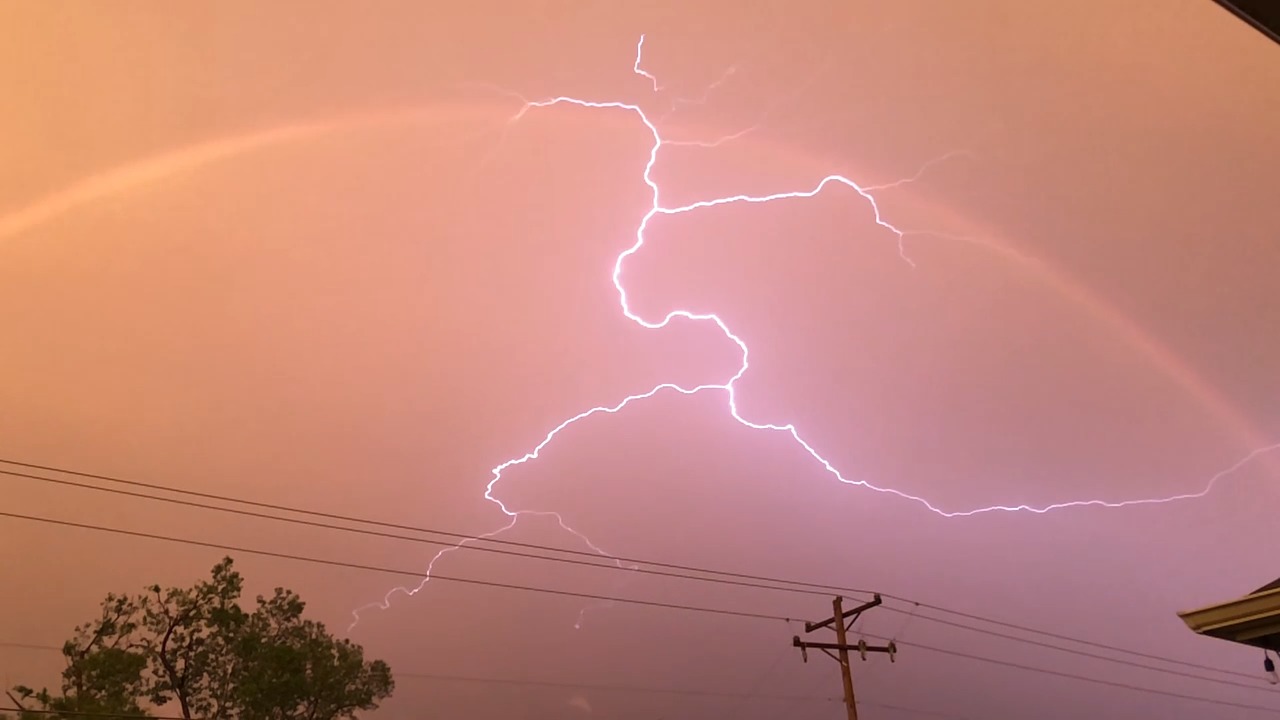 Spider Lightning Coincides With Rainbow in Sky During Storms in ...