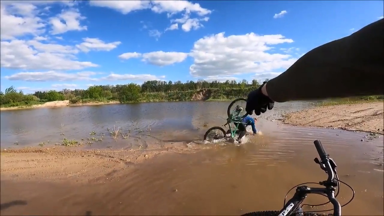 Guy Riding Bike Falls to Ground While Attempting to Jump Over Ditch ...