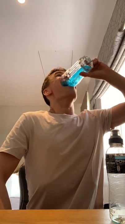 Guy Chugs Entire Bottle of Energy Drink in One Gulp | Jukin Licensing