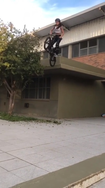 Girl Riding Bike Fails Miserably While Attempting to Jumping Off Ledge ...
