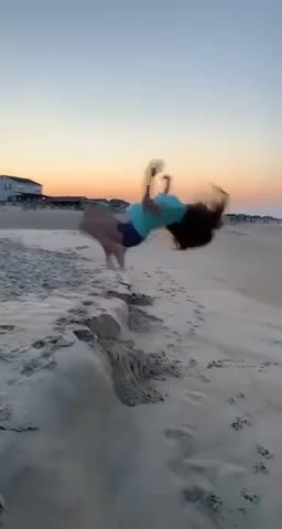 Girl Falls Hard On Her Neck While Performing a Backflip At the Beach ...