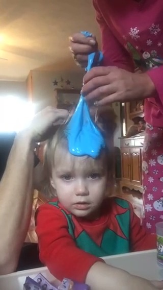 Parents Try to Remove Blue Slime Stuck in Kid's Hair | Jukin Licensing