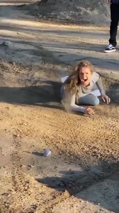Woman Falls Off Bike While Riding Over Sand Heap | Jukin Licensing