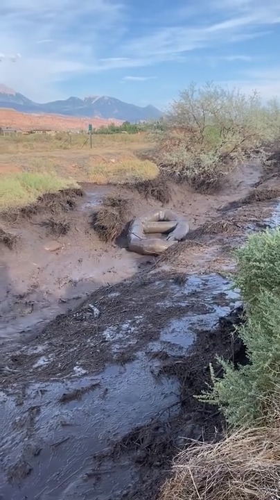 Raft Comes Floating Through Creek During Flash Flood | Jukin Licensing
