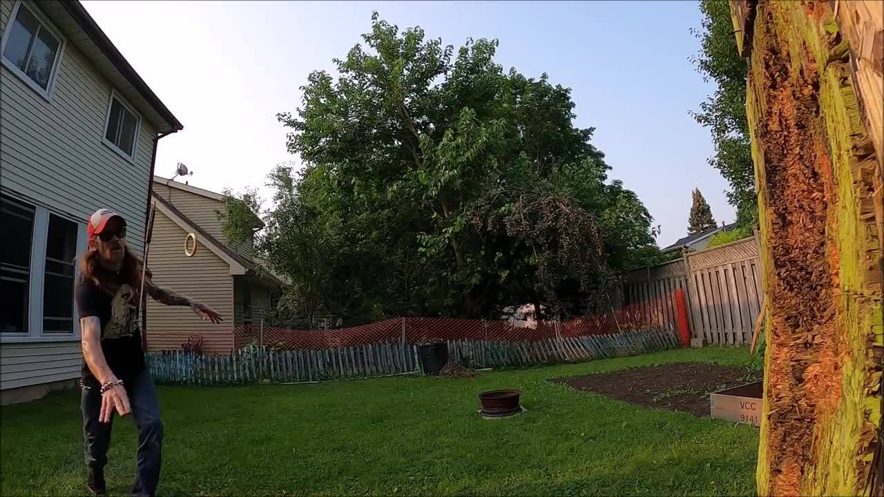 Man Hits Tree With a Knife By Throwing It Through a Ring | Jukin Licensing