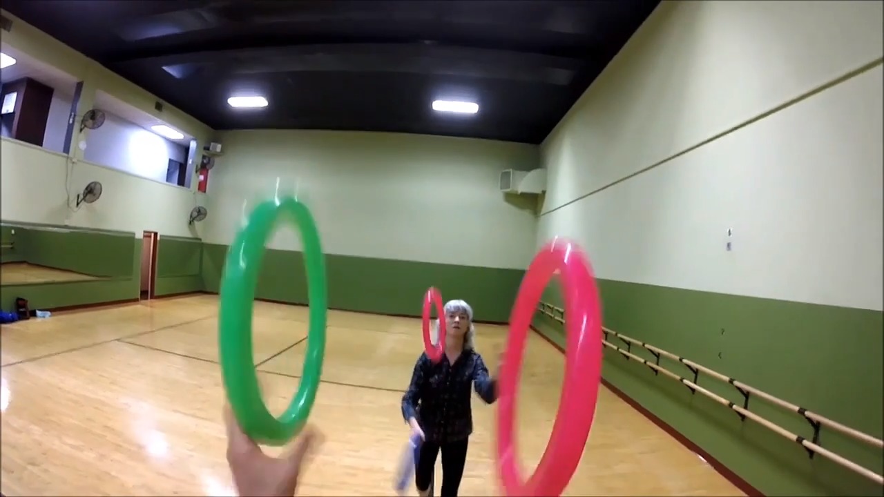 Elderly Duo Juggles And Passes Rings While Walking | Jukin Licensing