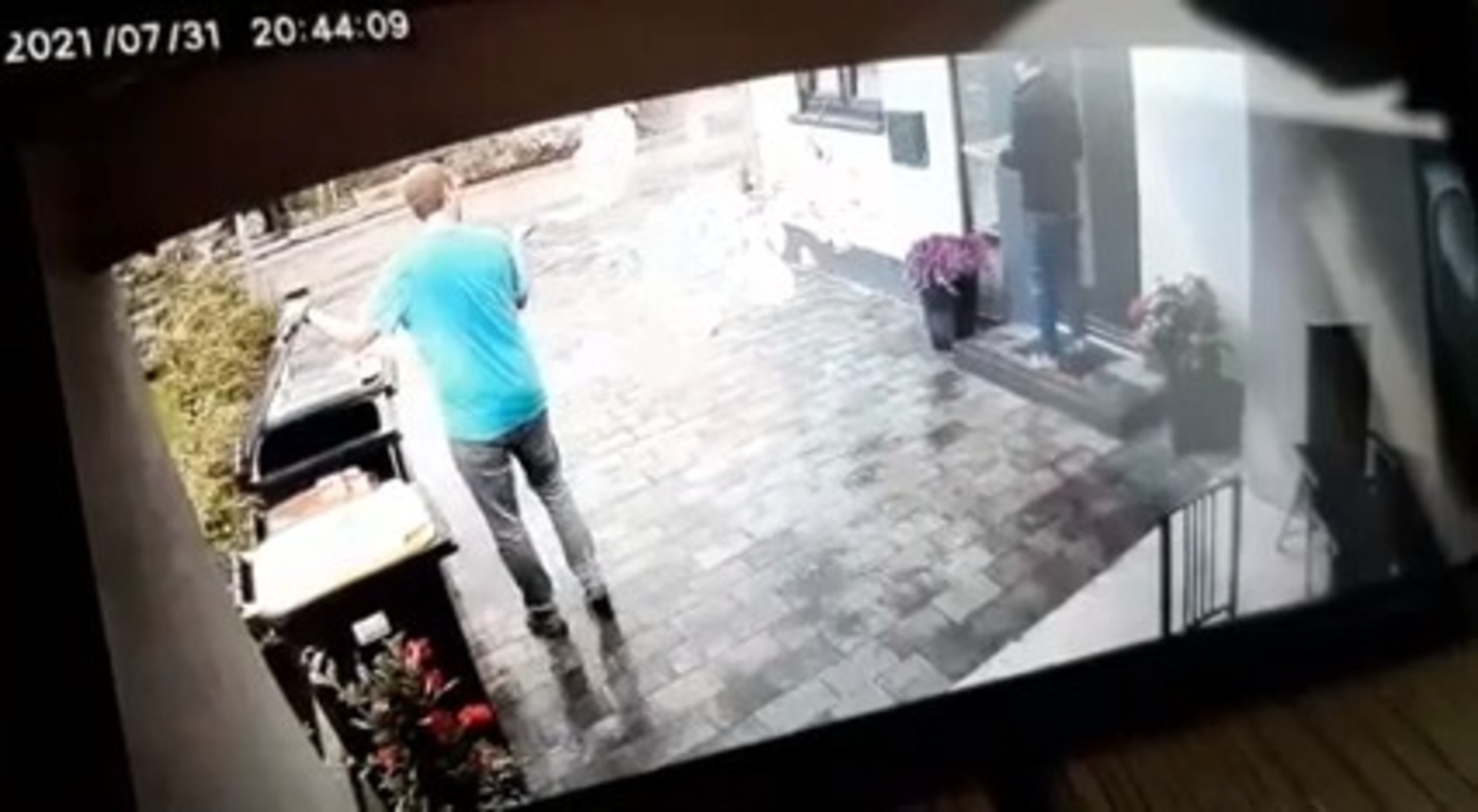 Trash Bag Rips Open Spilling Garbage Over Another Person When Man Tries ...