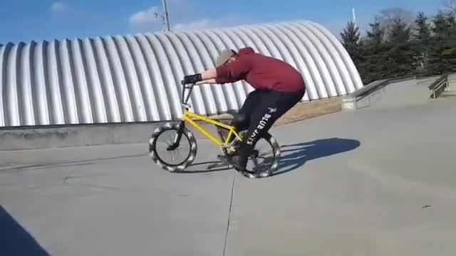 Man Attempting Trick With Bicycle Falls Over While Reversing It | Jukin ...