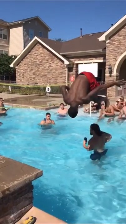 Guy Backflipping Into Pool Almost Lands on Friend's Head | Jukin Licensing