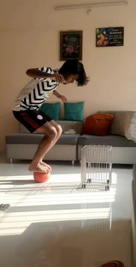 Man Trying to Balance Atop Ball Ends up Slipping and Falling Down ...