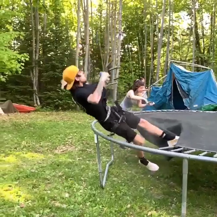 Guy Jumping on Trampoline Falls When Its Springs Snap | Jukin Licensing