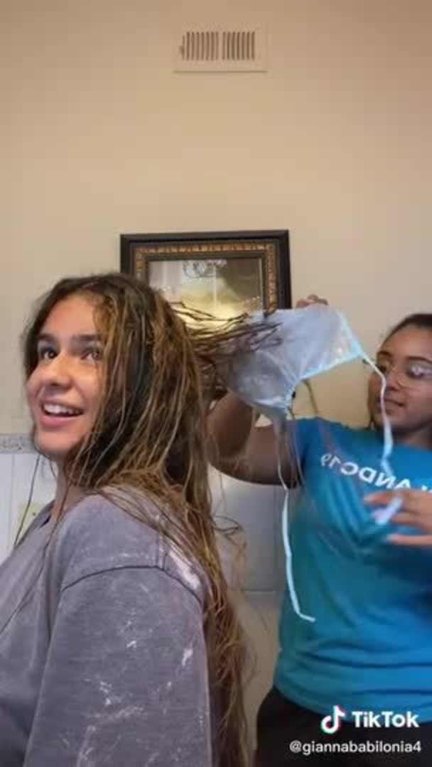 Highlighting Cap Gets Stuck On Woman's Hair As Friend Tries To Remove ...