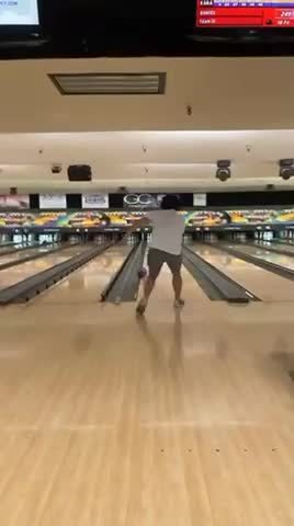 Guy Slips And Falls On His Back While Throwing Ball On the Bowling ...