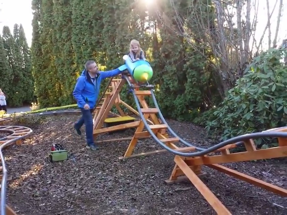Kid Enjoys Riding Rocket Cart on DIY Roller Coaster | Jukin Licensing