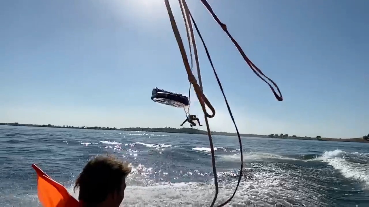 Guy Falls Off Of Boat While Tubing In Water | Jukin Licensing