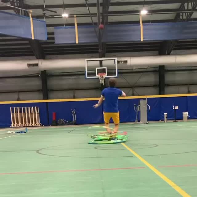 Man Makes Impressive Basketball Shot While Hula Hooping Multiple Hoops ...