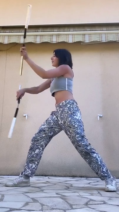 Woman Demonstrates Nunchuck Skills by Performing Tricks | Jukin Licensing