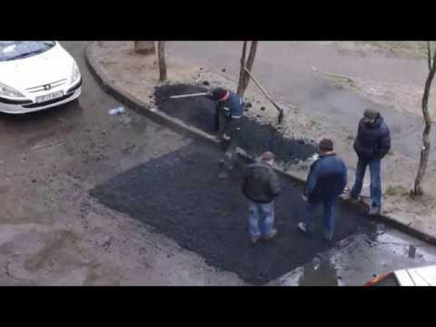 Guys Use Car to Smooth New Asphalt | Jukin Licensing