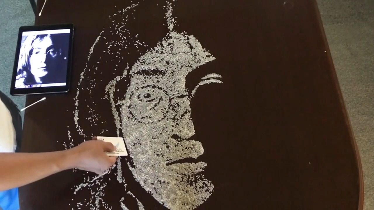 Artist Creates Portrait of Famous Musician Using Rice Grains | Jukin ...