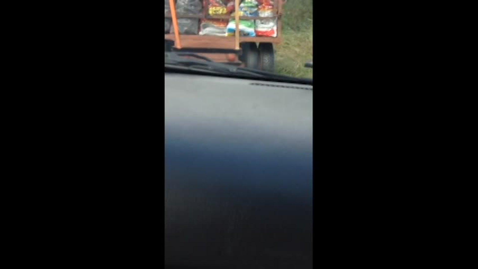 Driver Stuck Behind Slow Moving Truck | Jukin Licensing