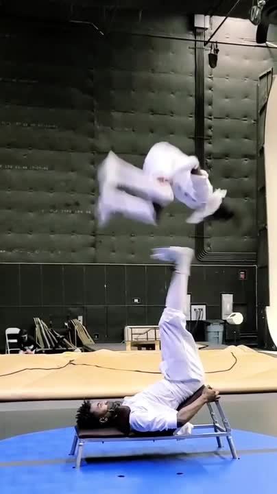 Person Flips Partner on Feet in Act of Foot Juggling | Jukin Licensing