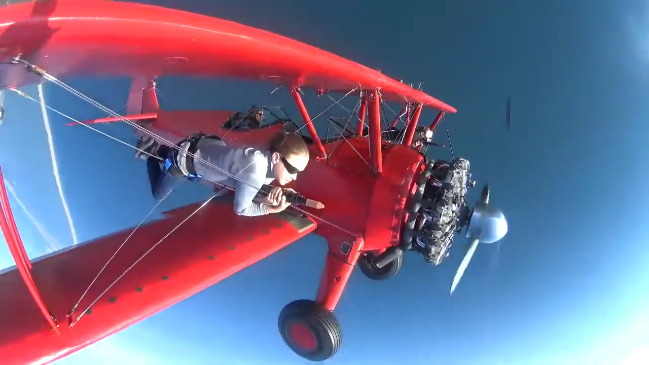 Two Little Girls Perform Wing Walking on Flying Biplane | Jukin Licensing