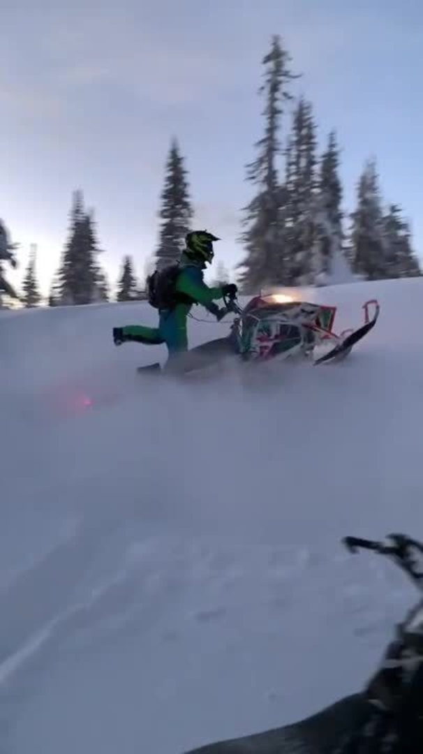 Person Performs Tricks On Their Snowmobile | Jukin Licensing