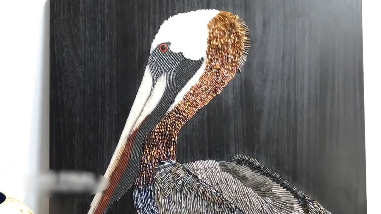 Woman Makes Mosaic of Bird Using Bugle Beads | Jukin Licensing