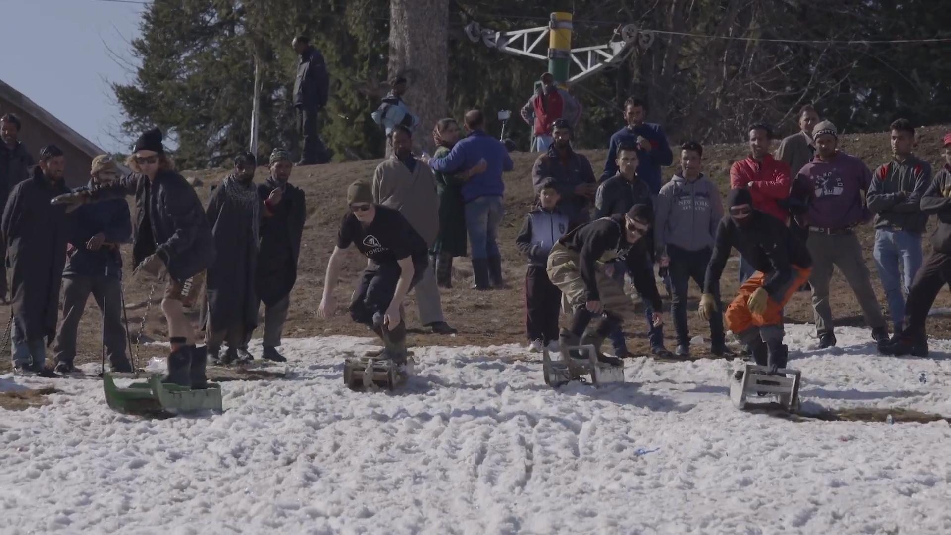 Guys Enjoy Racing Downhill on Sleds | Jukin Licensing