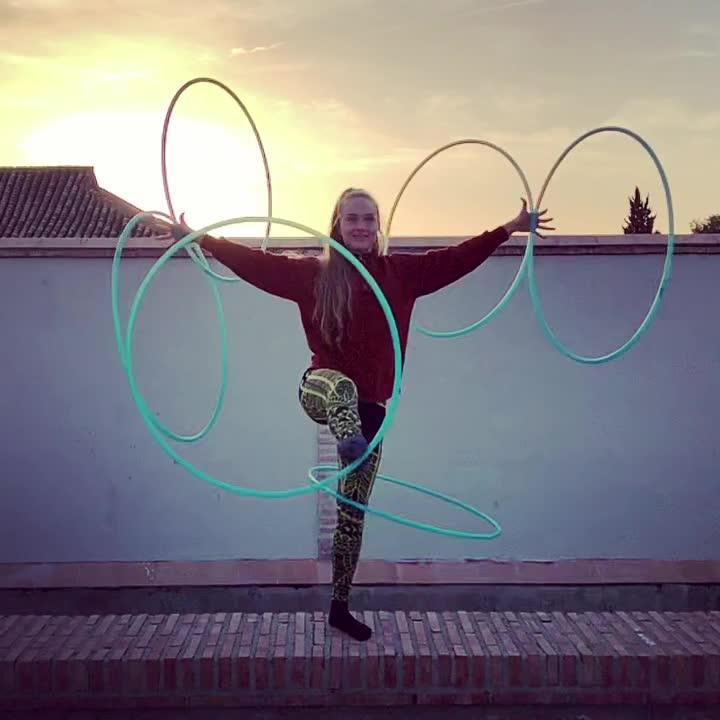 Girl Spins Multiple Hula Hoops at Once | Jukin Licensing