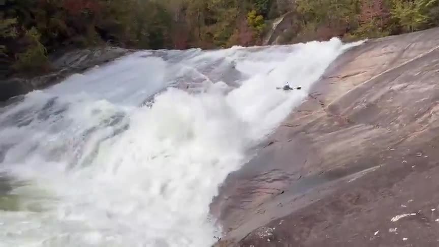 Kayaker Slids Through Steep Rapids | Jukin Licensing