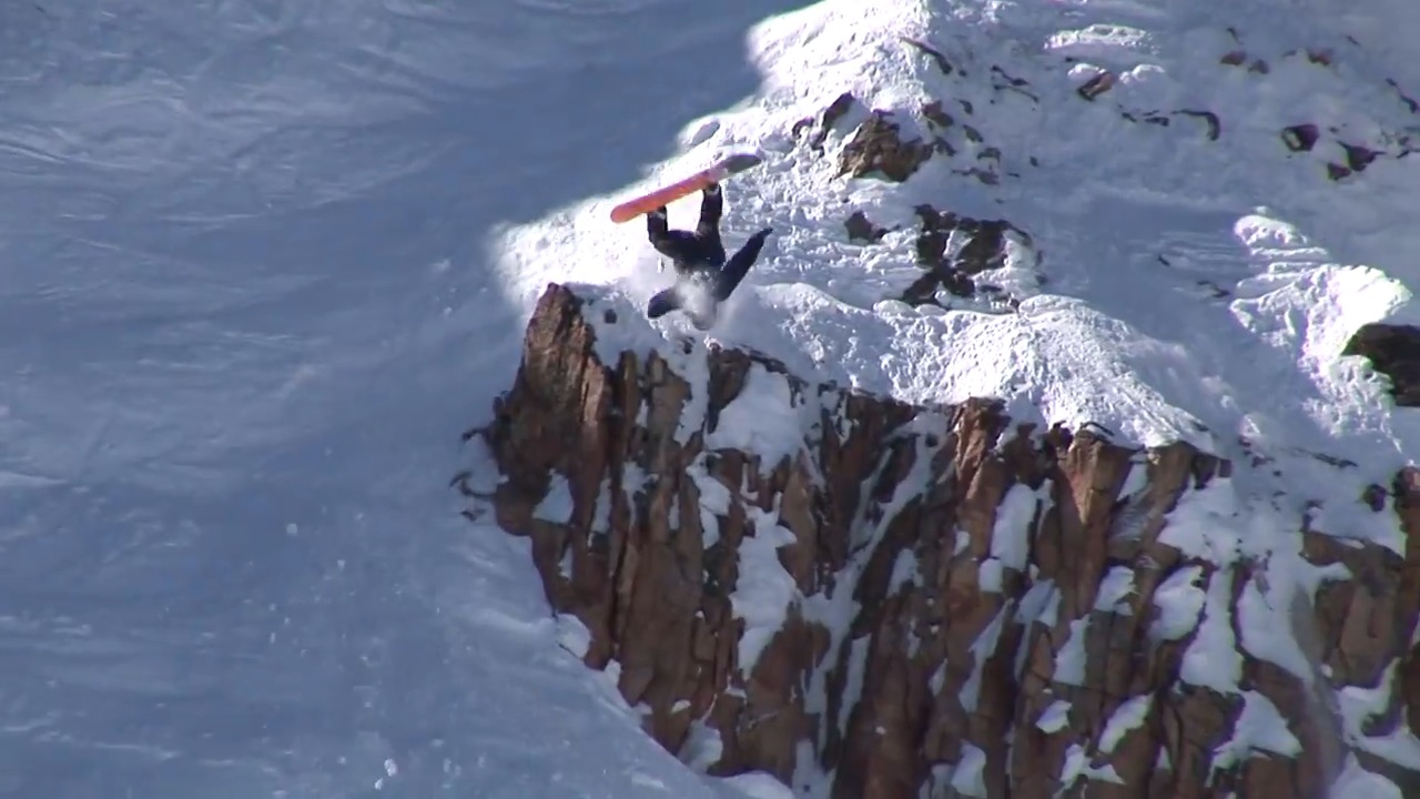 Snowboarder Does Backflip While Sliding Downhill | Jukin Licensing
