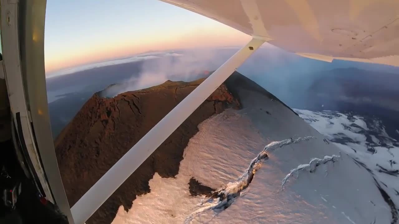 Plane Flies Over Live Volcano In Chile | Jukin Licensing