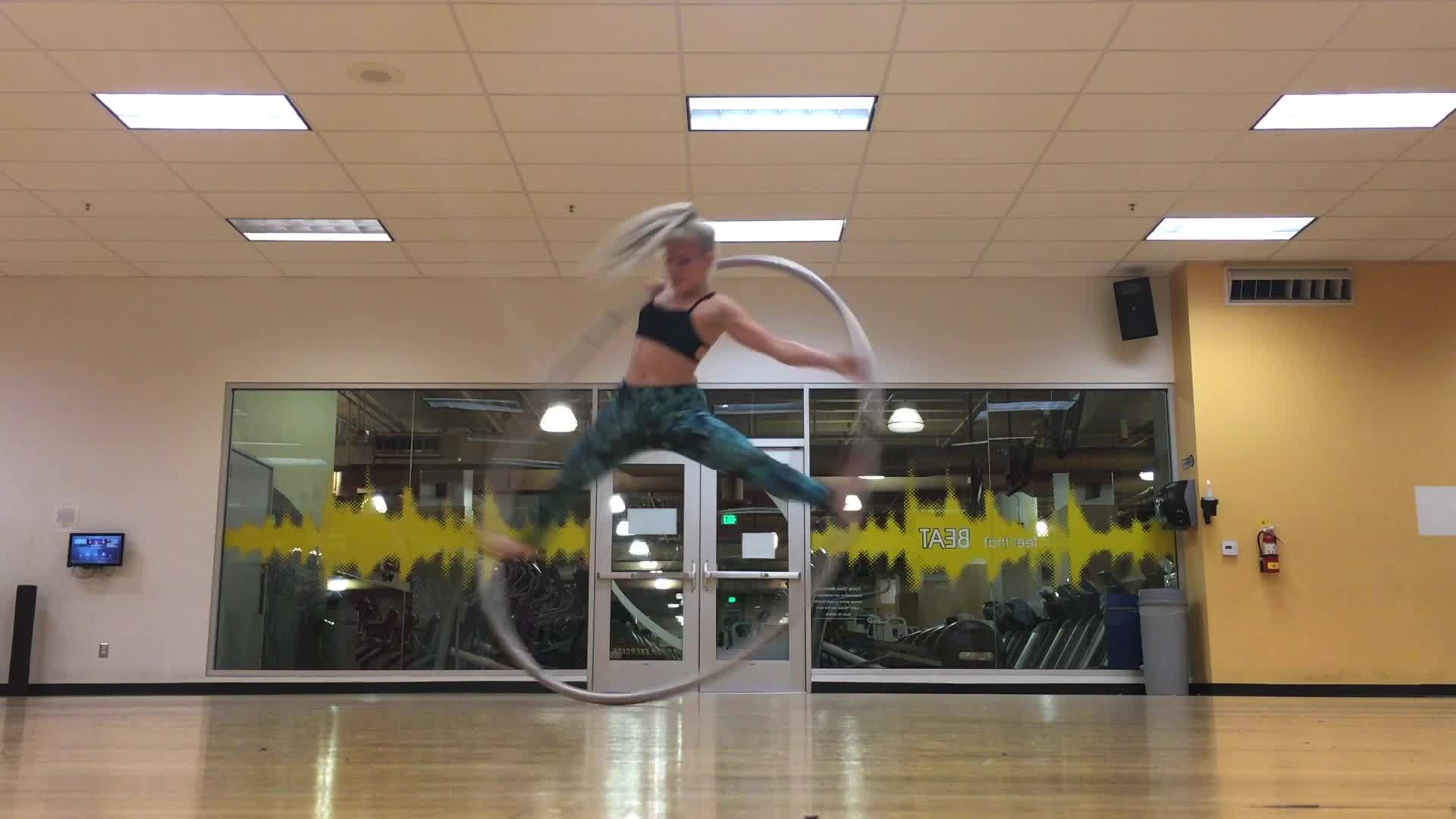 Acrobat Performs on Cyr Wheel | Jukin Licensing