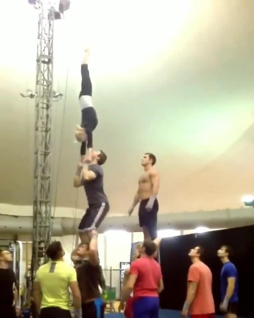 Acrobat Team Practice Hand-to-Hand Handstand Routine | Jukin Licensing