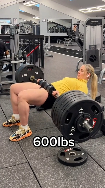 Girl Checks her One-repetition Maximum During Hip Thrusts | Jukin Licensing