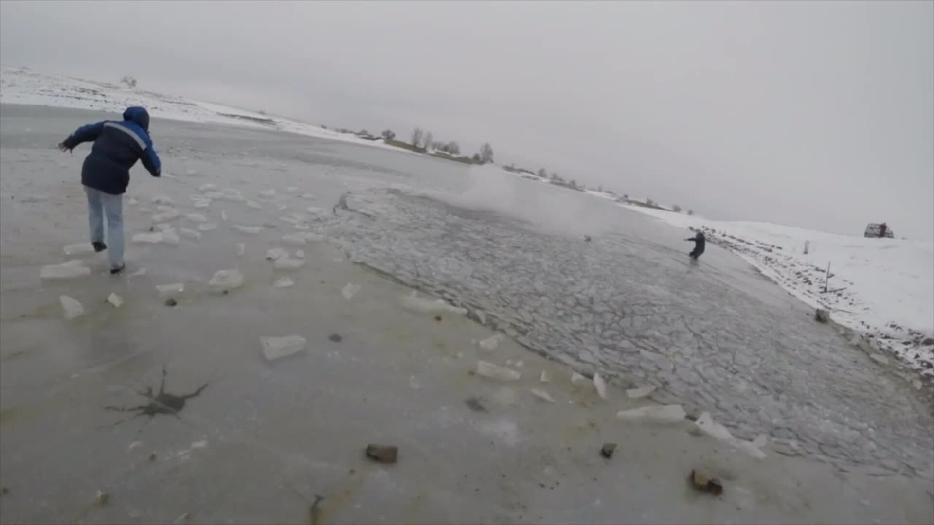 Burning Car Jumping into Frozen Lake | Jukin Licensing
