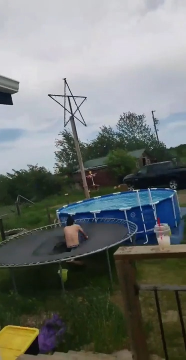 Leap from Rooftop to Trampoline Ends Bit Short | Jukin Licensing